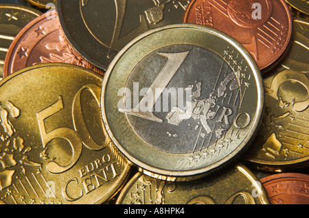 One euro coin, close-up, with inflation table in foreground Stock Photo ...
