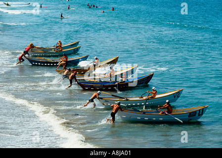 lifeguard dory racing boats Stock Photo - Alamy