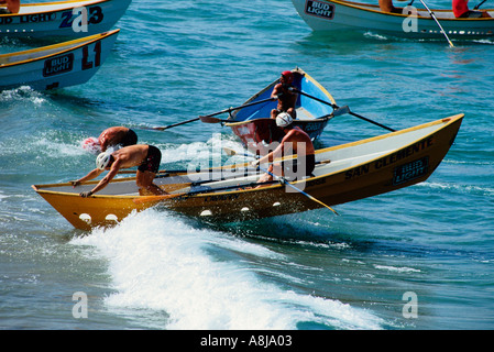 lifeguard dory racing boats Stock Photo - Alamy