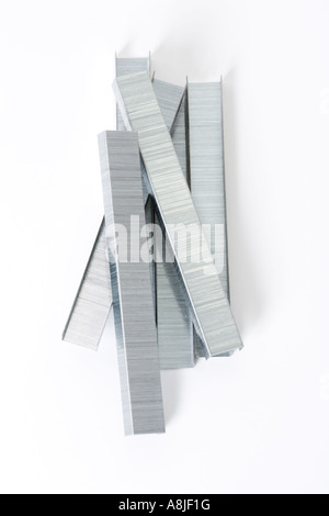 Staples piled together Stock Photo - Alamy