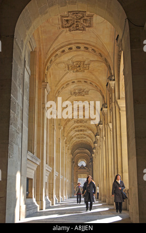 Louvre Museum. Tourists walk on the square of the Louver Museum Stock ...