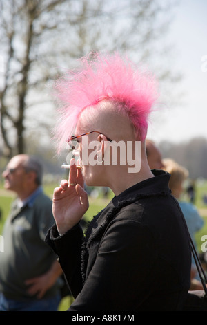 Punk with Pink Hair Smoking a Cigarette UK London Stock Photo - Alamy