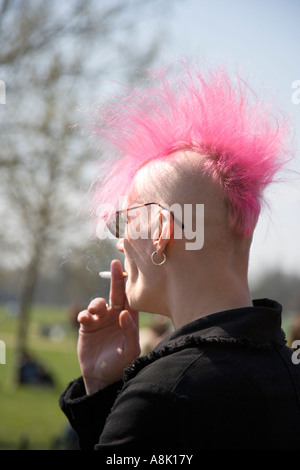 Portrait of man with cigarette, punk fashion and rockstar attitude on ...