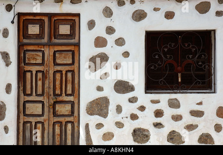 Whitewashed basalt stone house in typical style in the town of Aguimes ...