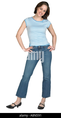 Woman standing with hands on her hips Stock Photo - Alamy