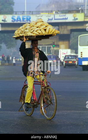 egyptian bread delivery man carrying traditional egyptian bread on his ...