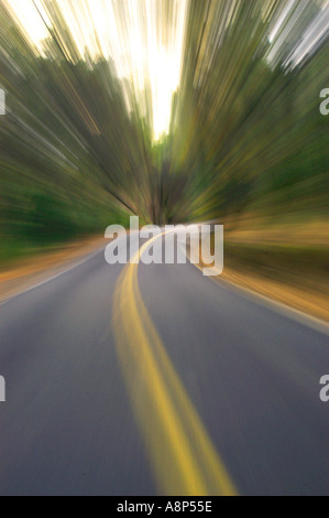 divided country road in motion Stock Photo - Alamy