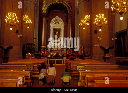 Mexicans, Mexican people, pilgrims, at prayer, praying, Old Basilica ...