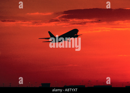 Jet plane taking off in cloudy sky, panoramic shot Stock Photo - Alamy