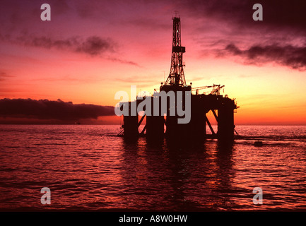 Australia. Bass Strait. Off shore oil and gas field and rig at sunrise ...