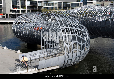 View of spectacular new steel Webb Bridge over Yarra River in Docklands ...