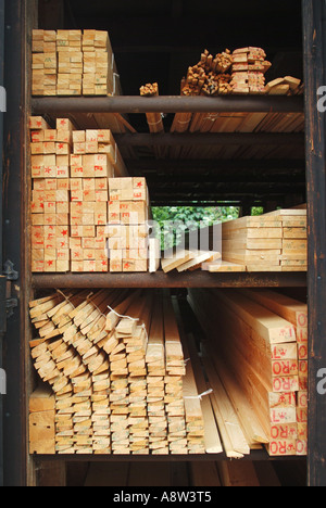 Timber yard with prepared wrot timber in racks awaiting selection and ...