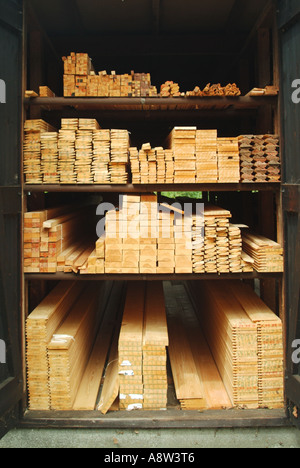 Timber yard with prepared wrot timber in racks awaiting selection and ...