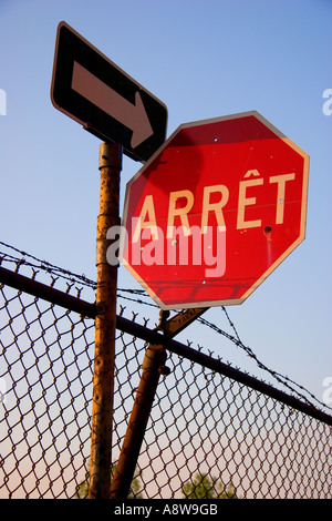 Contradictory street signs in french, Montreal Quebec Stock Photo - Alamy
