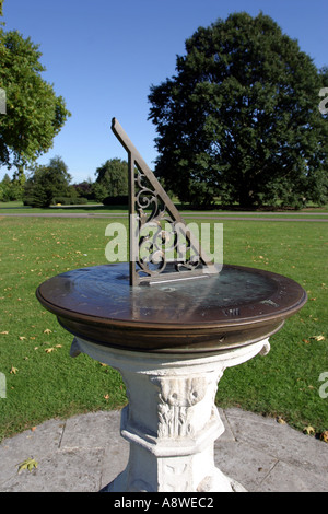 Antique sun dial in an English garden on summers day Stock Photo - Alamy