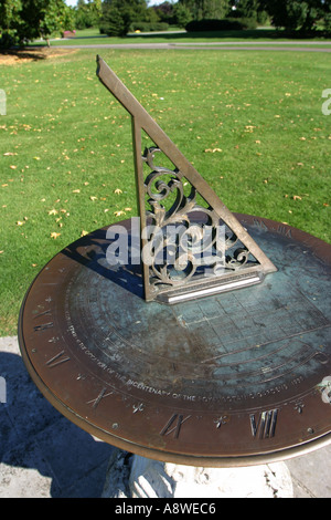 Antique sun dial in an English garden on summers day Stock Photo - Alamy