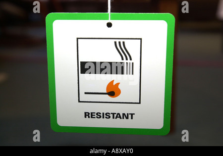 Sofa fire safety warning label Stock Photo - Alamy