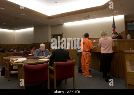Defendant and District Attorney talking to judge O Malley Jackson ...