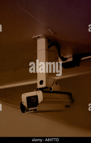 CCTV camera on orange building facade as copy space Stock Photo - Alamy