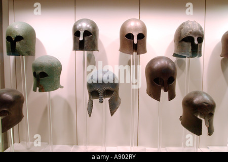 A group of ancient bronze helmets at the Achaeological Museum of ...
