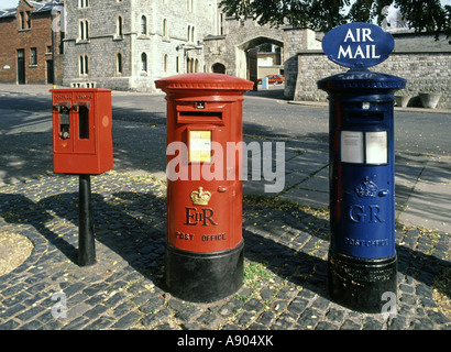 Windsor Berkshire traditional red pillar box alongside blue airmail ...