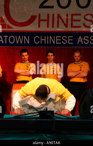 Breaking Bricks and Blocks with human head Stock Photo - Alamy