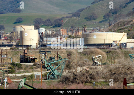 Oil wells and tanks at the San Ardo field along US 101, California ...