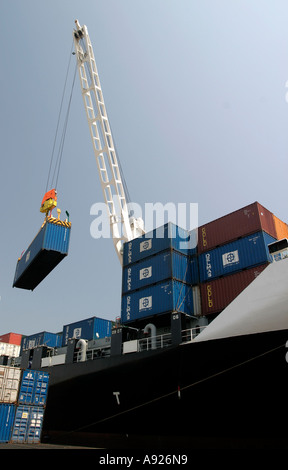 Containers loading on harbor port Stock Photo - Alamy
