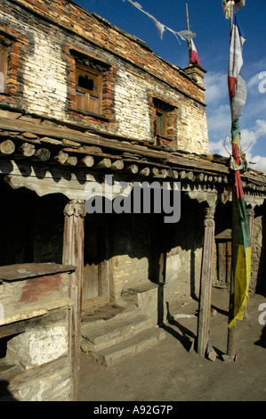 Entrance of a rustic monastery Gompa with abutments made of wood Nar ...