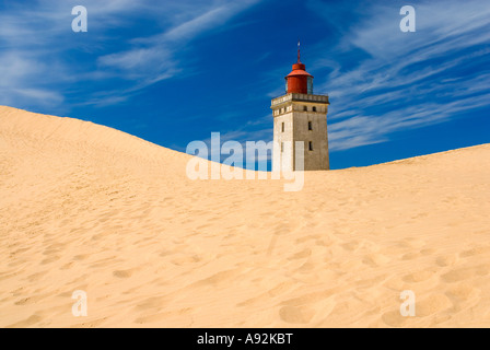 Lighthouse buried by a shifting sand dune at Rubjerg near Loekken ...