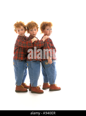 Triplet with red hair Stock Photo - Alamy