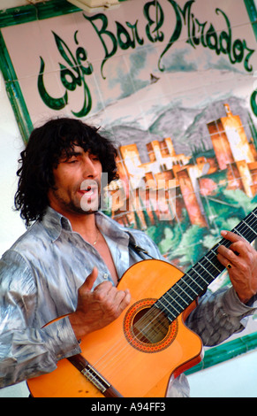Spain, Andalucia, Granada, Flamenco singer and guitar players ...