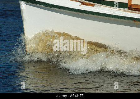 bow of small boat moving thorough water Stock Photo - Alamy