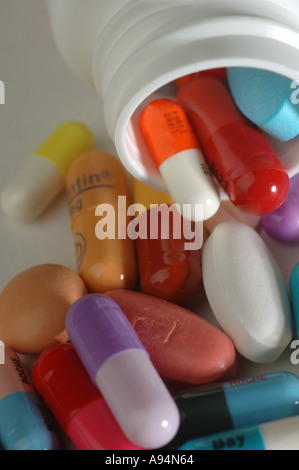 pills spill from overflowing bottle dsca 3143 Stock Photo - Alamy