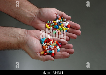 comparison between candy and drugs held in two 2 male hands dsca 3182 ...