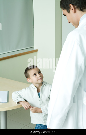 Boy in doctor's office Stock Photo - Alamy