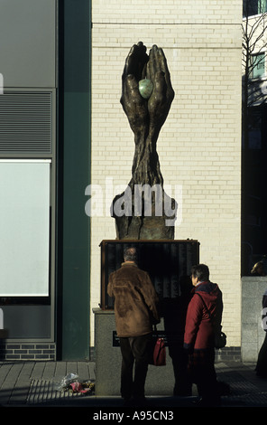 The Tree of Life Blitz War Memorial and the Church of Saint Martin, in ...