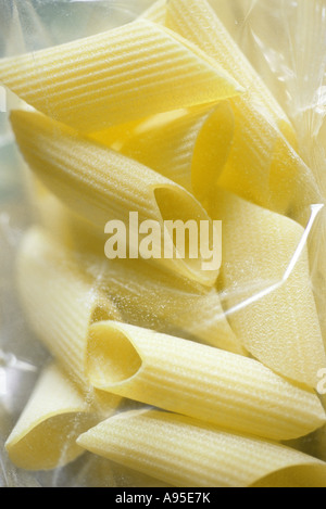 Penne pasta in plastic package isolated on white background Stock Photo ...