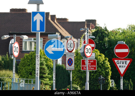 Confusing road signs in Surrey England Stock Photo - Alamy