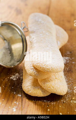 Sponge fingers with icing sugar FoodCollection Stock Photo - Alamy