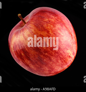 Red apple cut on black background with reflection Stock Photo - Alamy