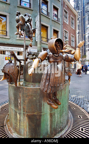 Sculpture at a public fountain in Aachen in Germany Stock Photo - Alamy