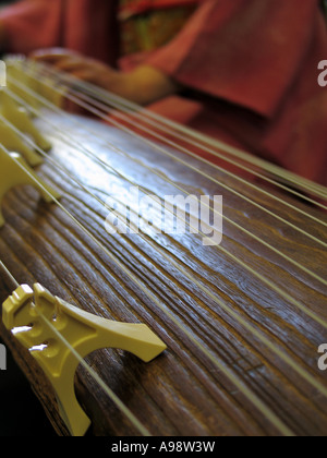 Japanese women play on koto Stock Photo - Alamy