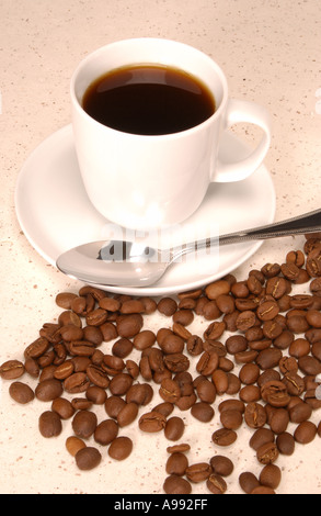 Cup of americano black coffee with spoon and plate on table food and ...