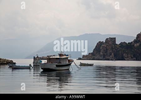 Fishing boats moored inside seawall at the marina on the Mar Tirreno ...