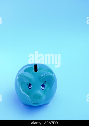 A closeup of a blue piggy bank isolated on a white background Stock ...