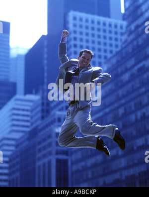 AIRBORNE OFFICE WORKER JUMPING IN MID AIR OFFICE BUILDINGS MANHATTAN ...