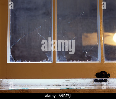 BROKEN WINDOW PANES OF FRAME OF OPEN BASEMENT WINDOW Stock Photo - Alamy