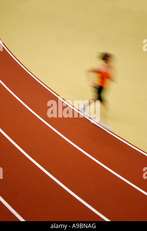 runner leader run ahead of sprint race on turn stadium track, summer ...