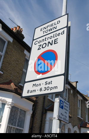 Traffic sign indicating times of parking in a controlled zone ...